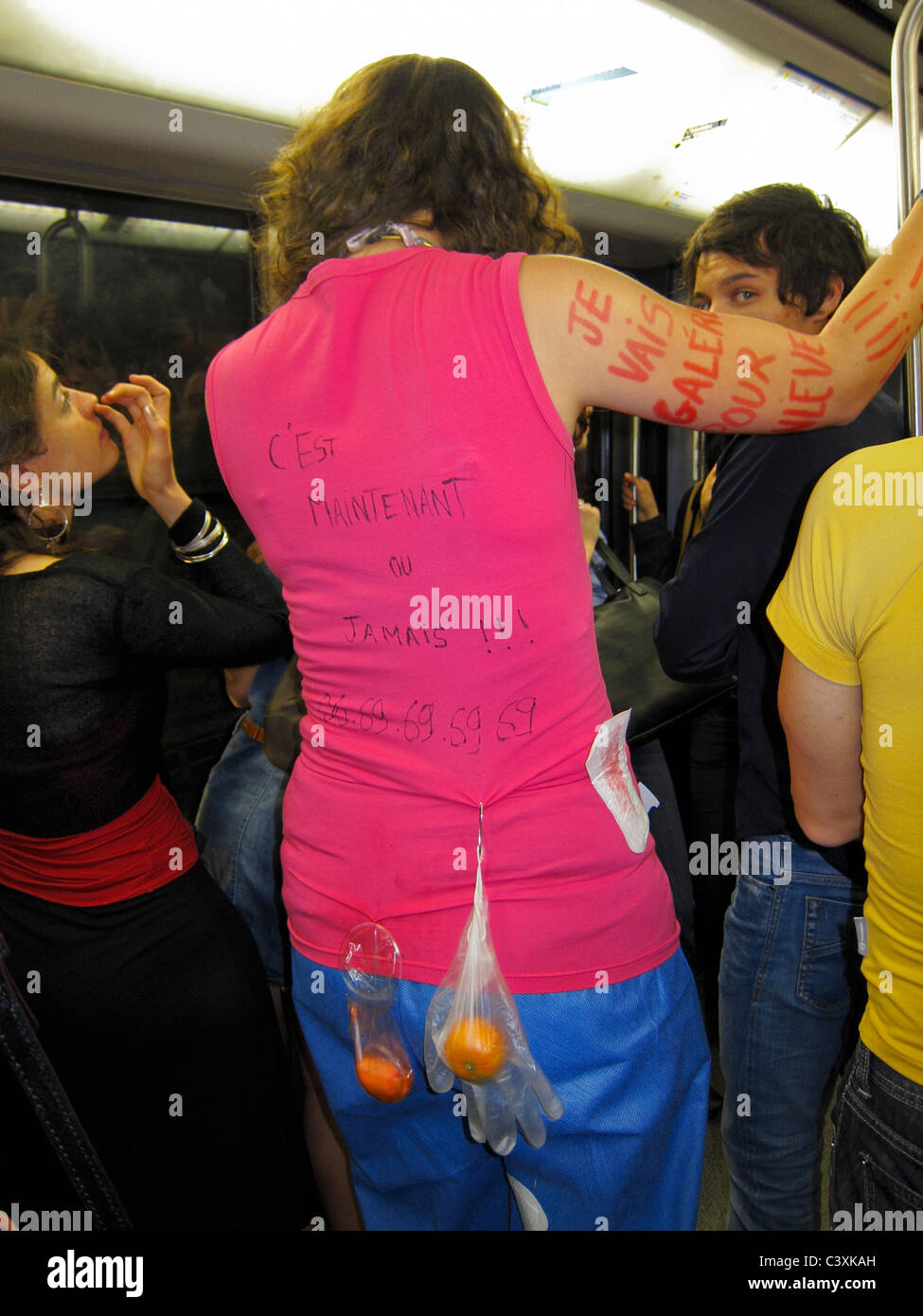 Paris, France, Teenage Girl with Embarrassing Objects pinned to her ...