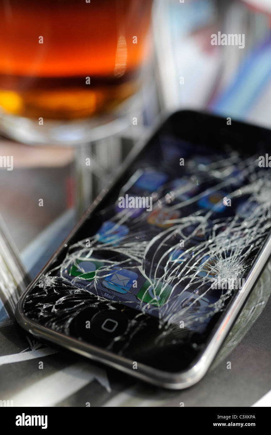 english man with a smashed iphone in the street Stock Photo - Alamy