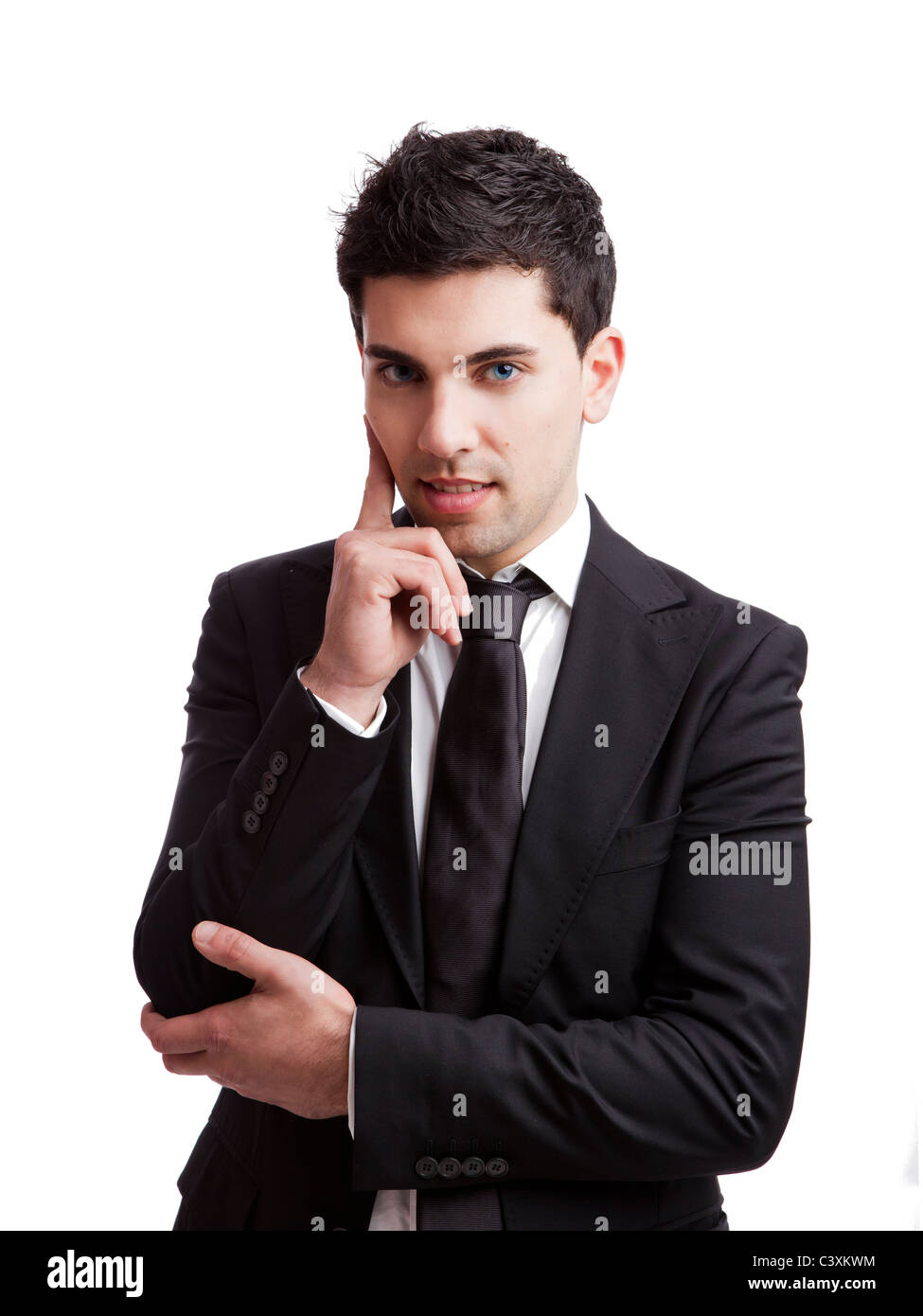 Studio portrait of a young businessman isolated over a white background ...