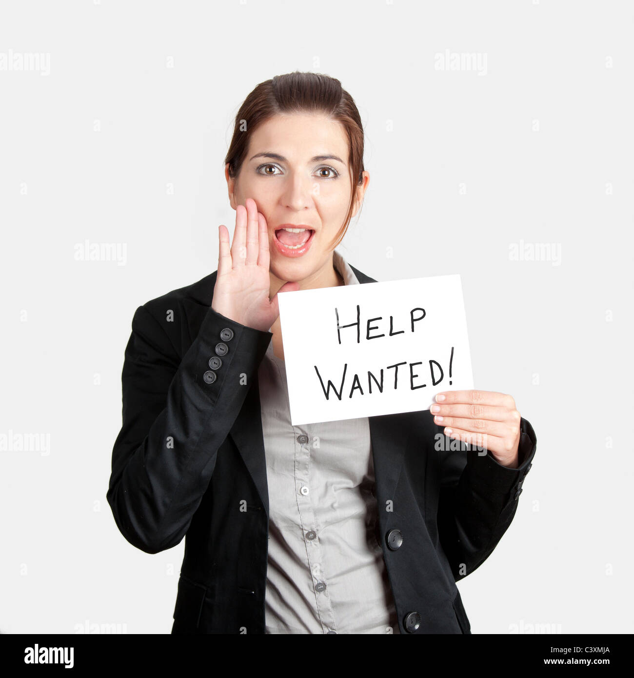 Business woman calling for help holding a cardboard with the text ...