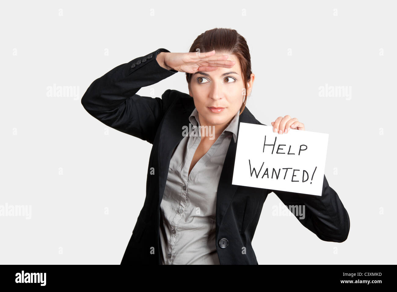 Business woman search for help holding a cardboard with the text ...