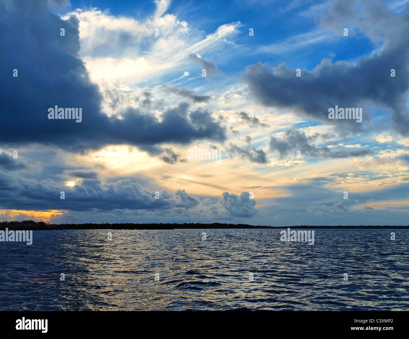 This mixture of colors and cloud types with some radiating shapes at ...