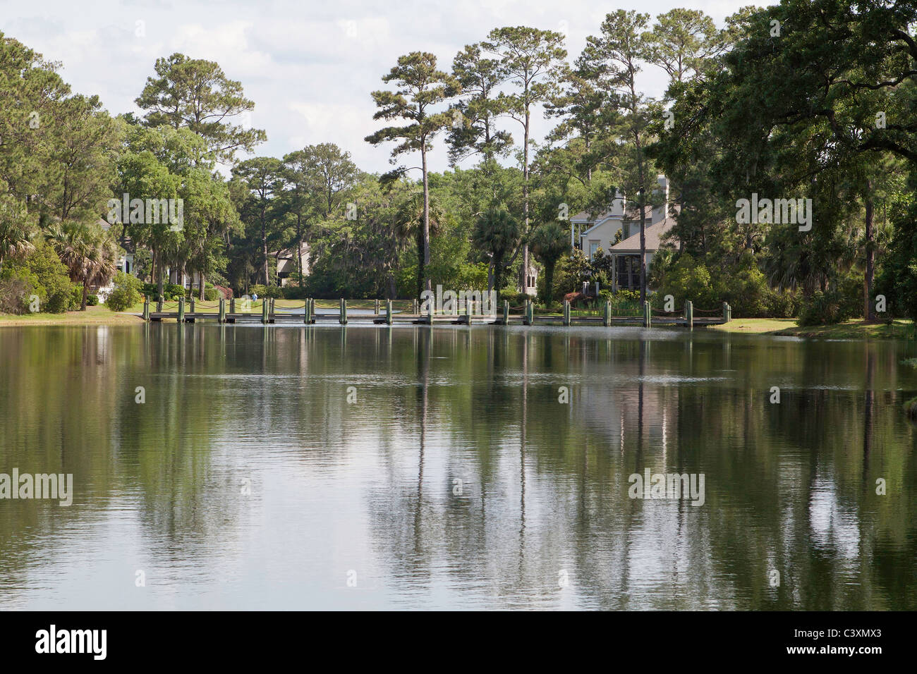Residential lagoon & pond with a strolling boardwalk ...