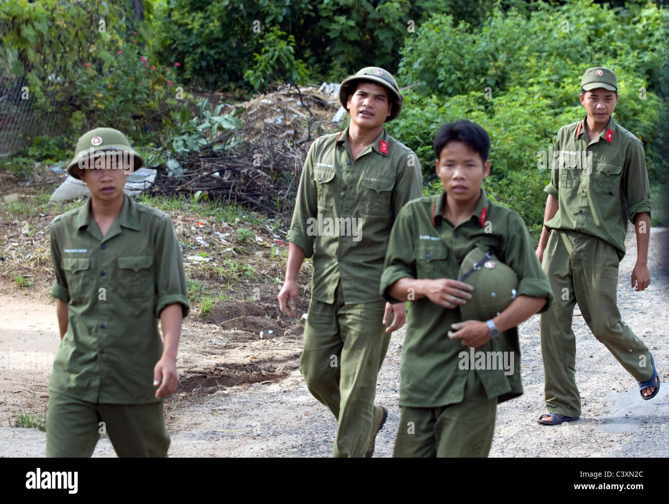 Vietnamese soldiers walk down the road Stock Photo - Alamy