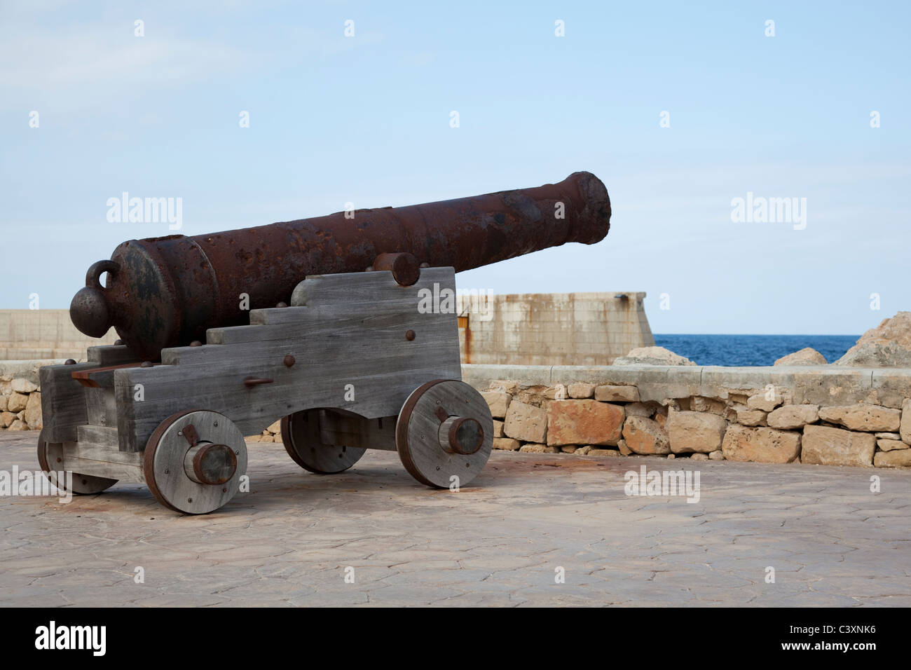 Ancient cannon in a harbor directed towards the sea Stock Photo - Alamy