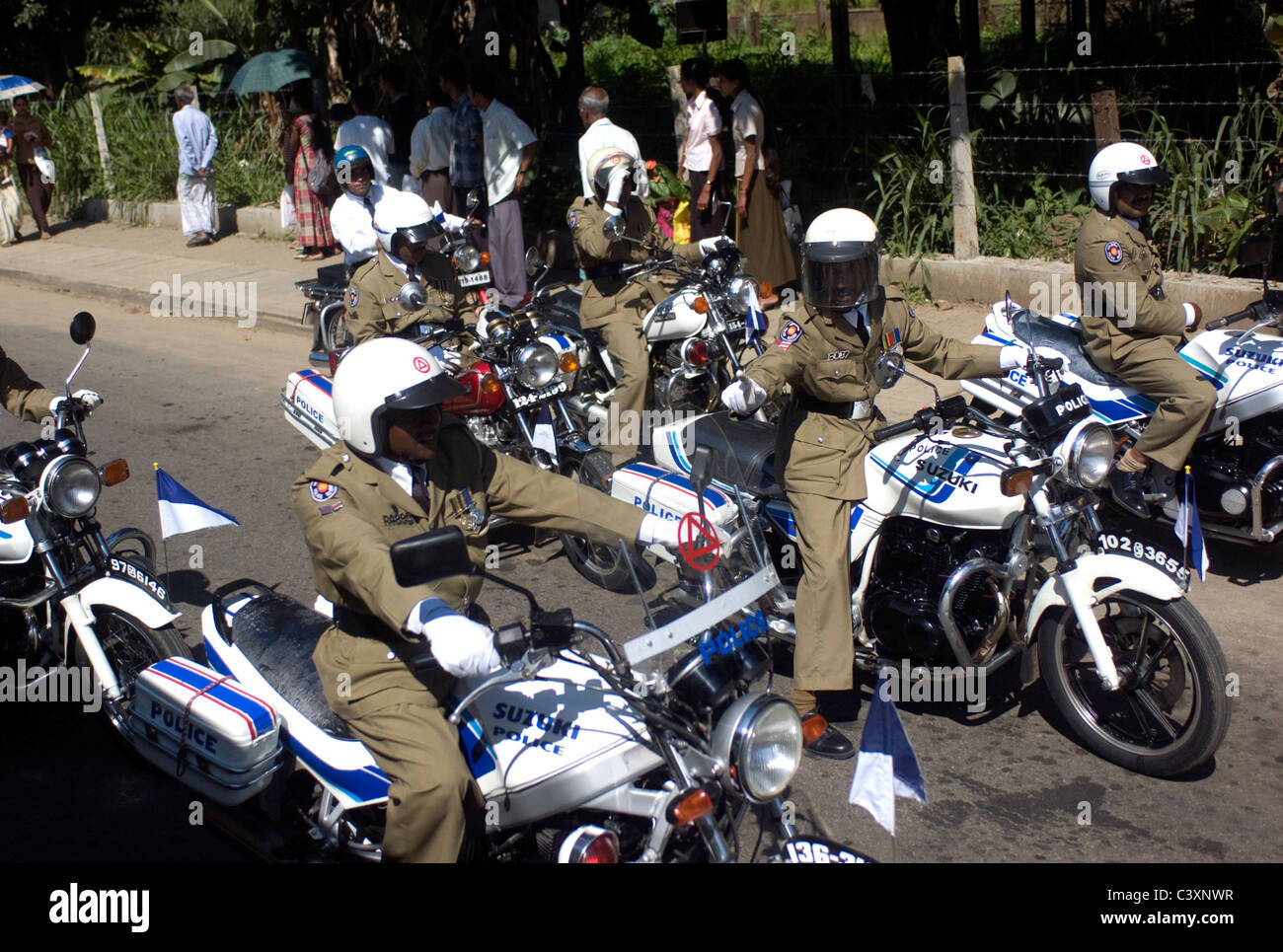 Police ride motorcycles down the street Stock Photo - Alamy