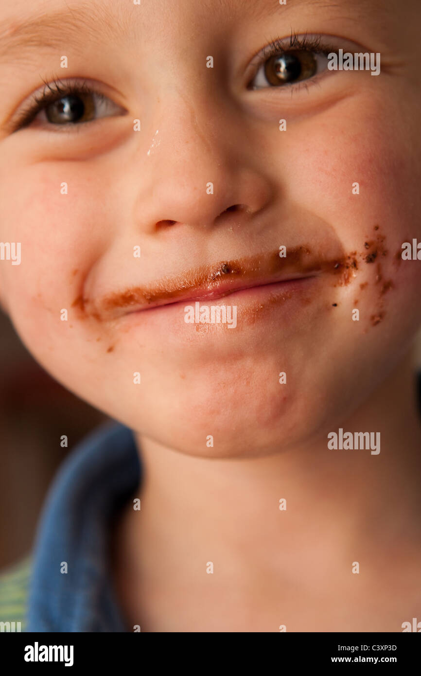 Cute Baby With Chocolate On Face