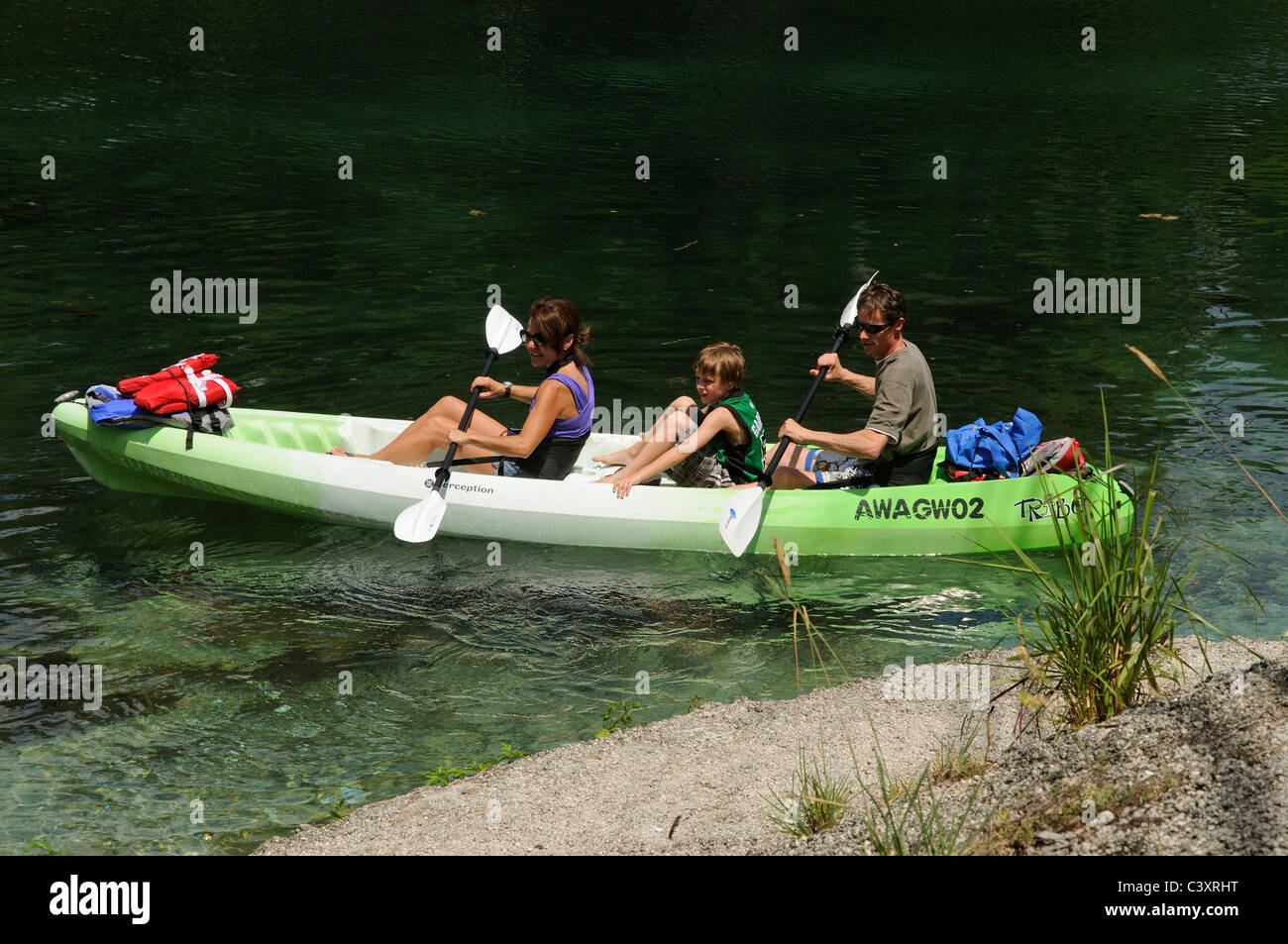 Family kayaking on the Rainbow River at Dunnellon Florida USA Stock ...