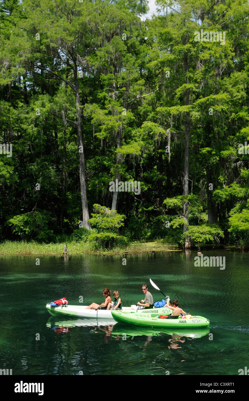 Family kayaking on the Rainbow River at Dunnellon Florida USA Stock ...