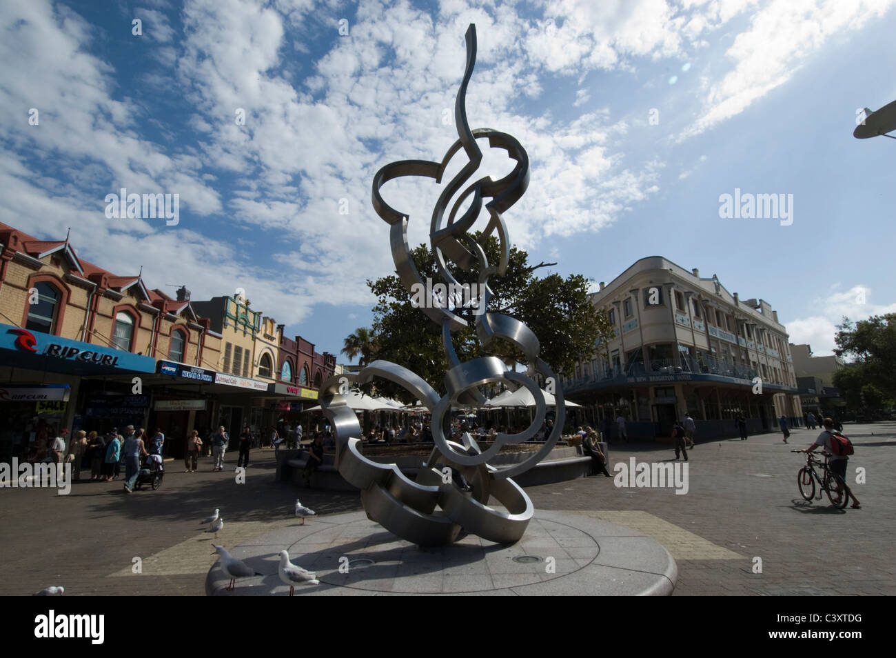 A statue on the pedestrian walk way Stock Photo - Alamy