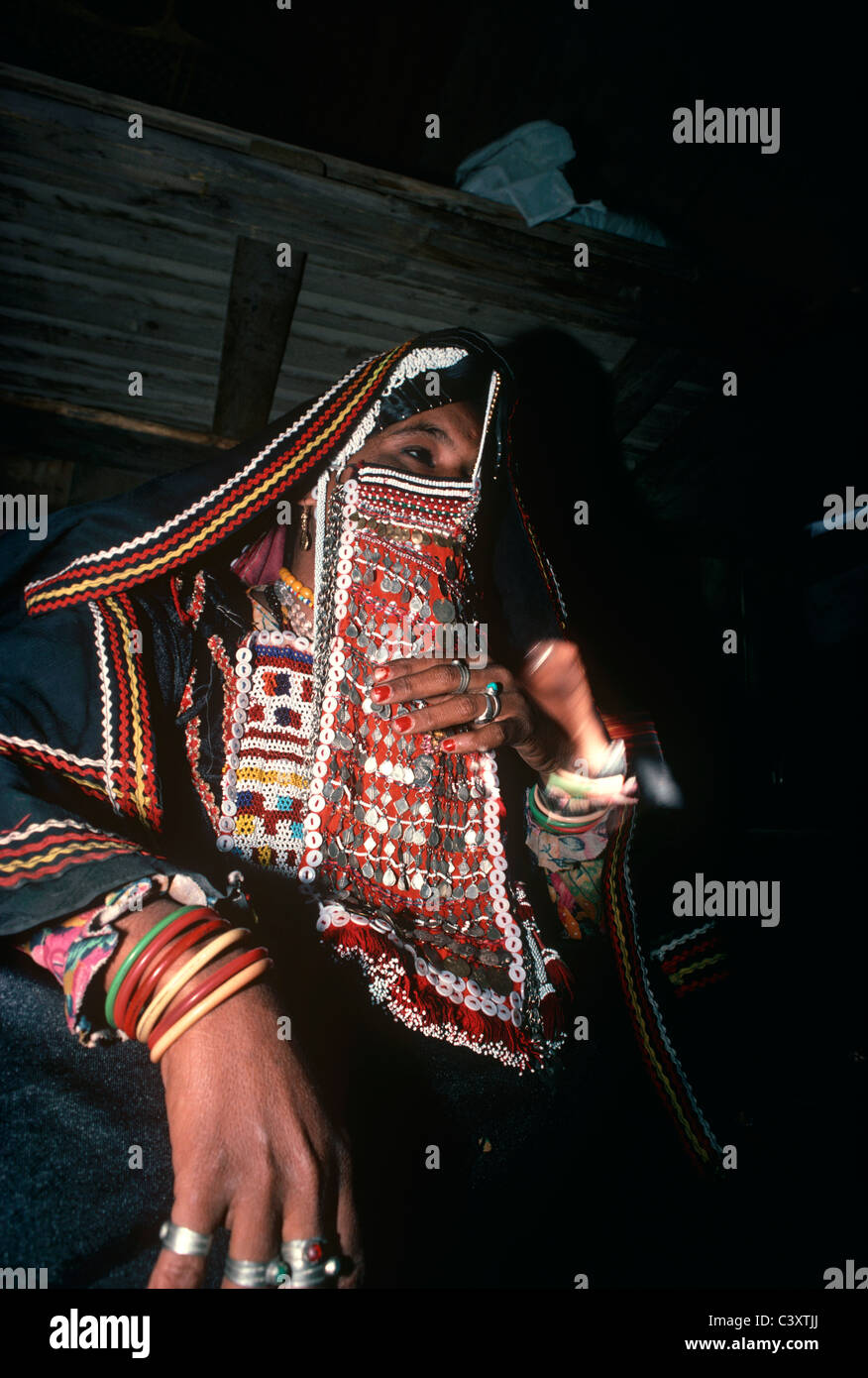 Bedouin woman at home wearing a traditiontal wedding veil. Sinai, Egypt ...