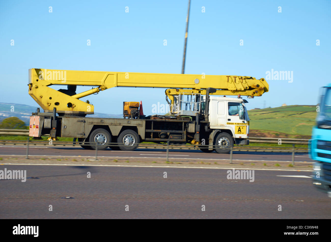 Green cherry picker hi-res stock photography and images - Alamy