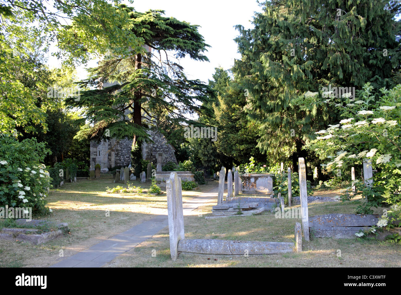 Saint Mary the Virgin churchyard in Ewell village, Epsom Surrey England ...