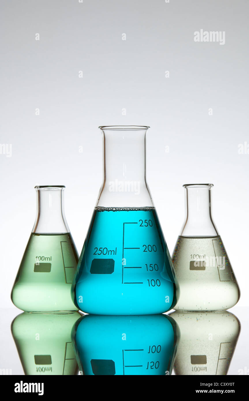 three beakers with color liquid Stock Photo - Alamy