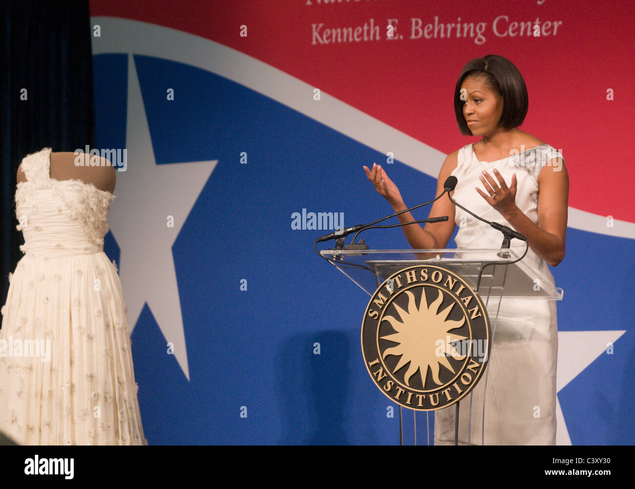 Michelle Obama and Jason Wu look at the inaugural gown during a ...