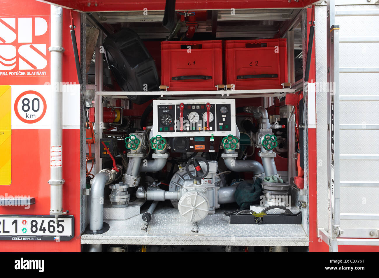 Fire engines, water hoses, nozzles and other equipment at a fire ...