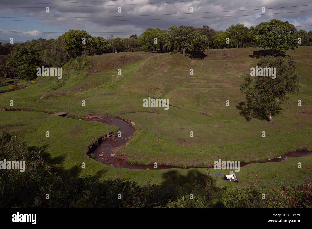 a couple liedown at rough castle antonine wall roman fort near falkirk ...