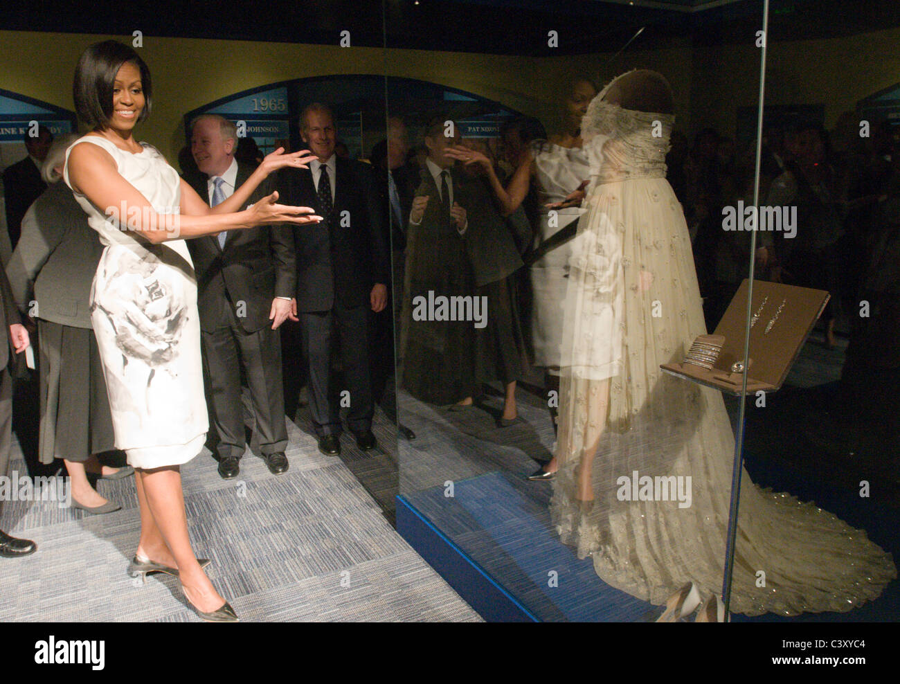 Michelle Obama and Jason Wu look at the inaugural gown during a ...