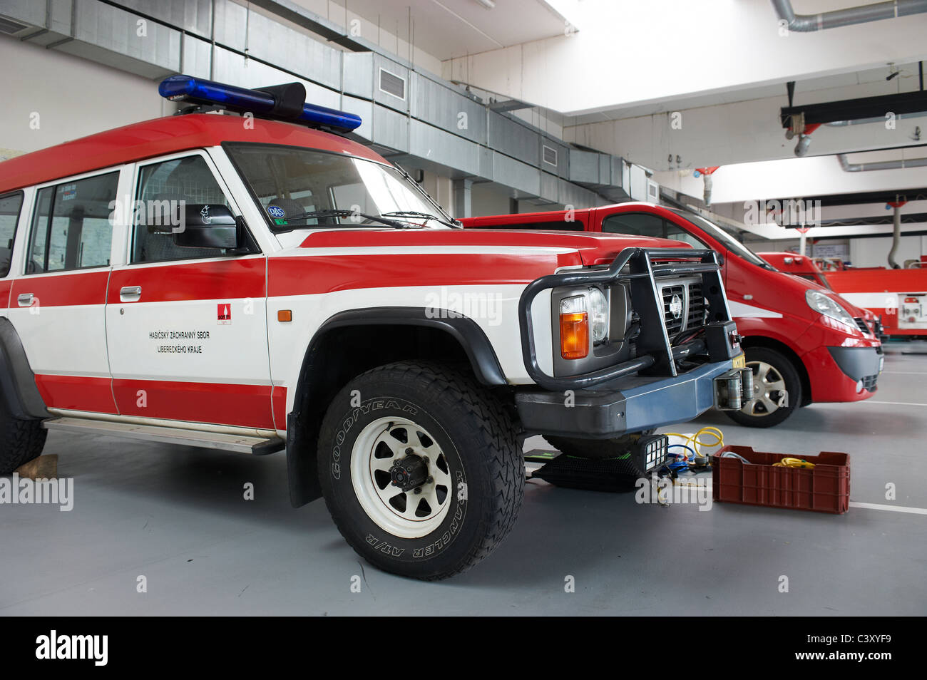 Fire engines, water hoses, nozzles and other equipment at a fire ...