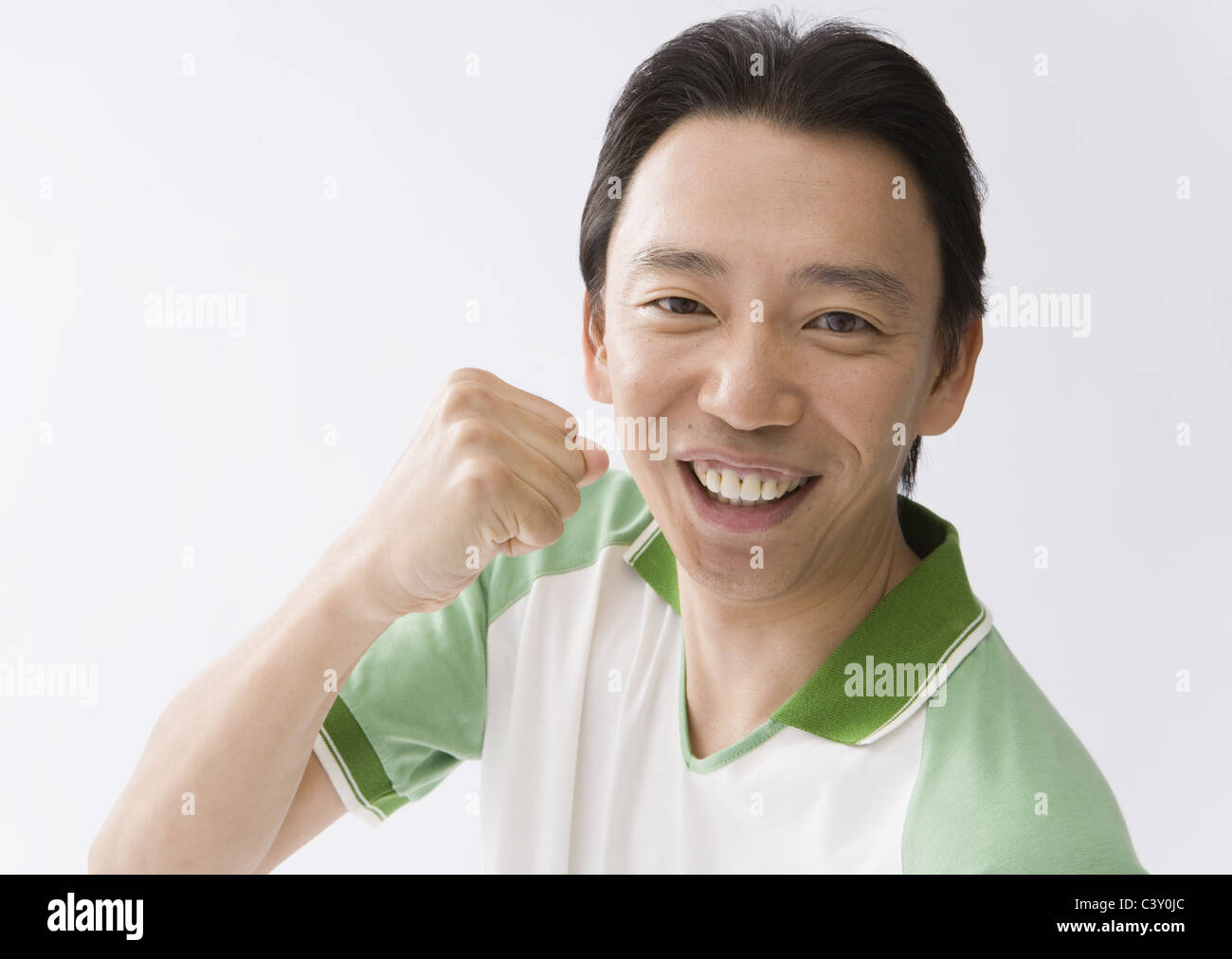 Fist pumping hi-res stock photography and images - Alamy