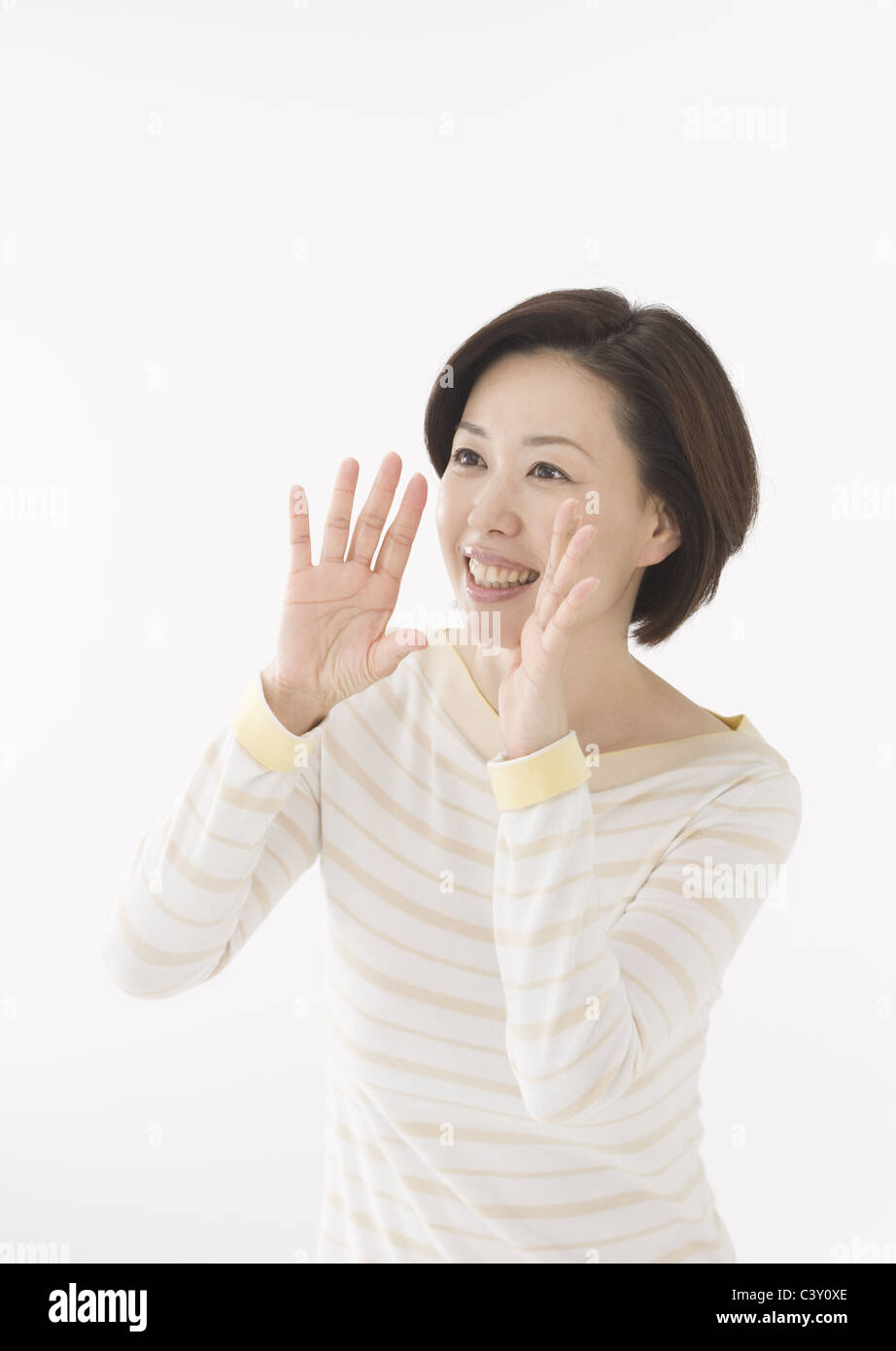 Woman calling out Stock Photo - Alamy