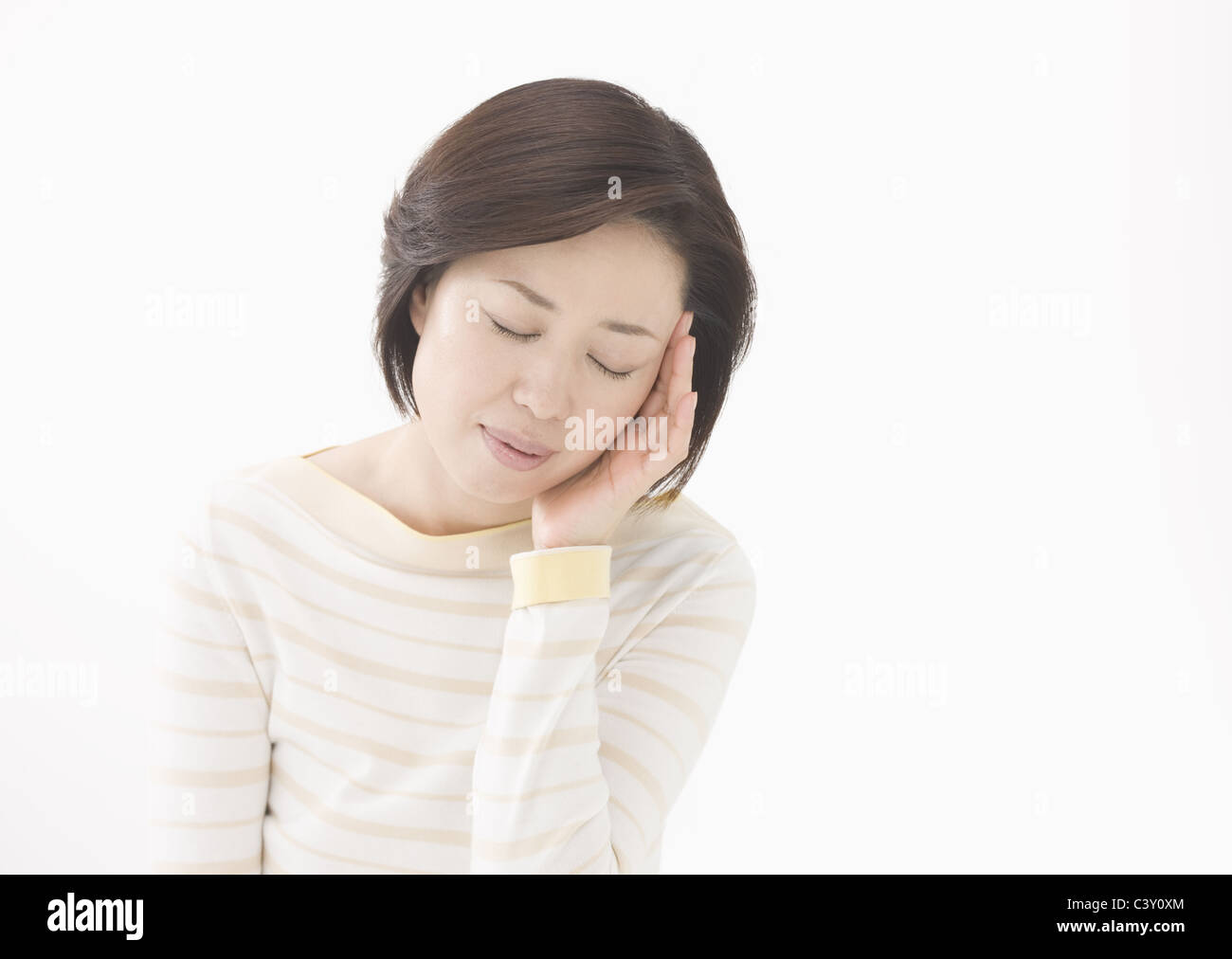 Hand on temple hi-res stock photography and images - Alamy