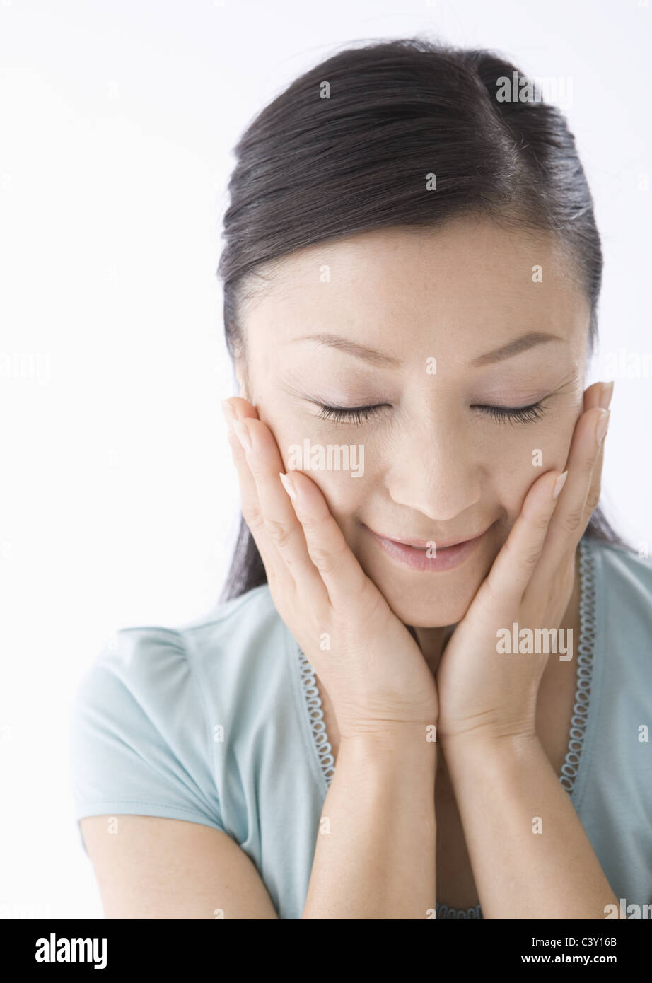 Pinch cheek hi-res stock photography and images - Alamy