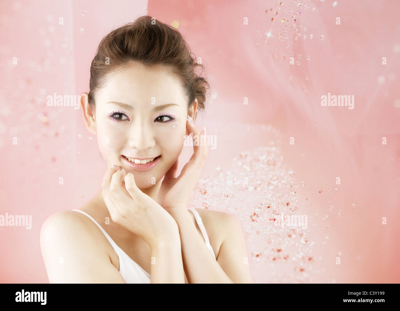 Young woman smiling Stock Photo - Alamy