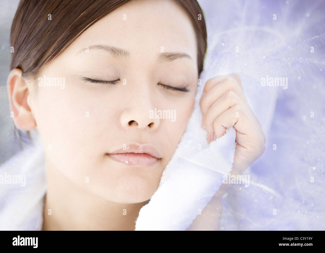 Young woman closing eyes Stock Photo - Alamy