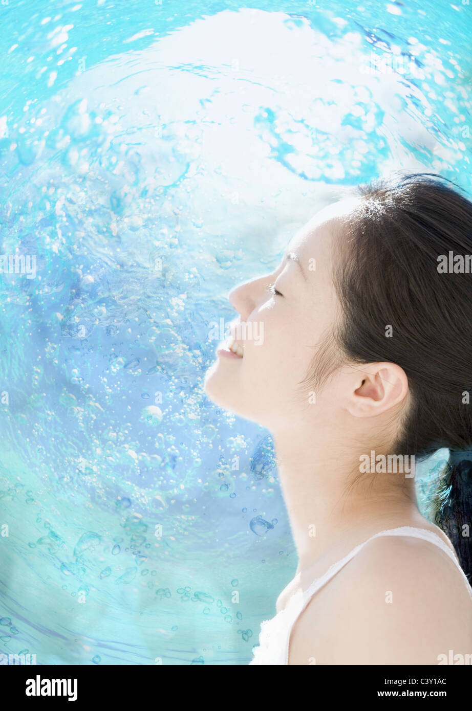 Water flow and young woman Stock Photo - Alamy