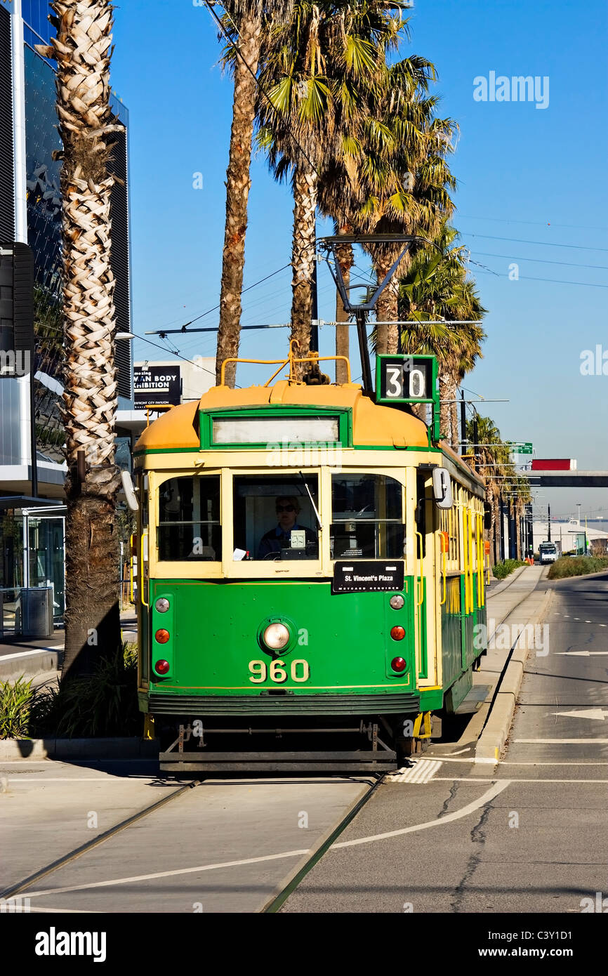 Melbourne Australia / A classic older model tram traveling through the ...