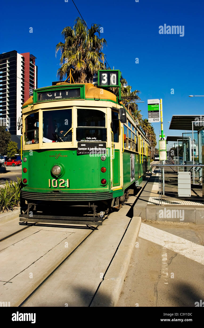 Melbourne Australia / A classic older model tram traveling through the ...