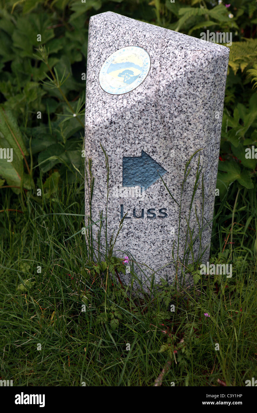 Directional marker sign showing the way to the village of Luss on the ...