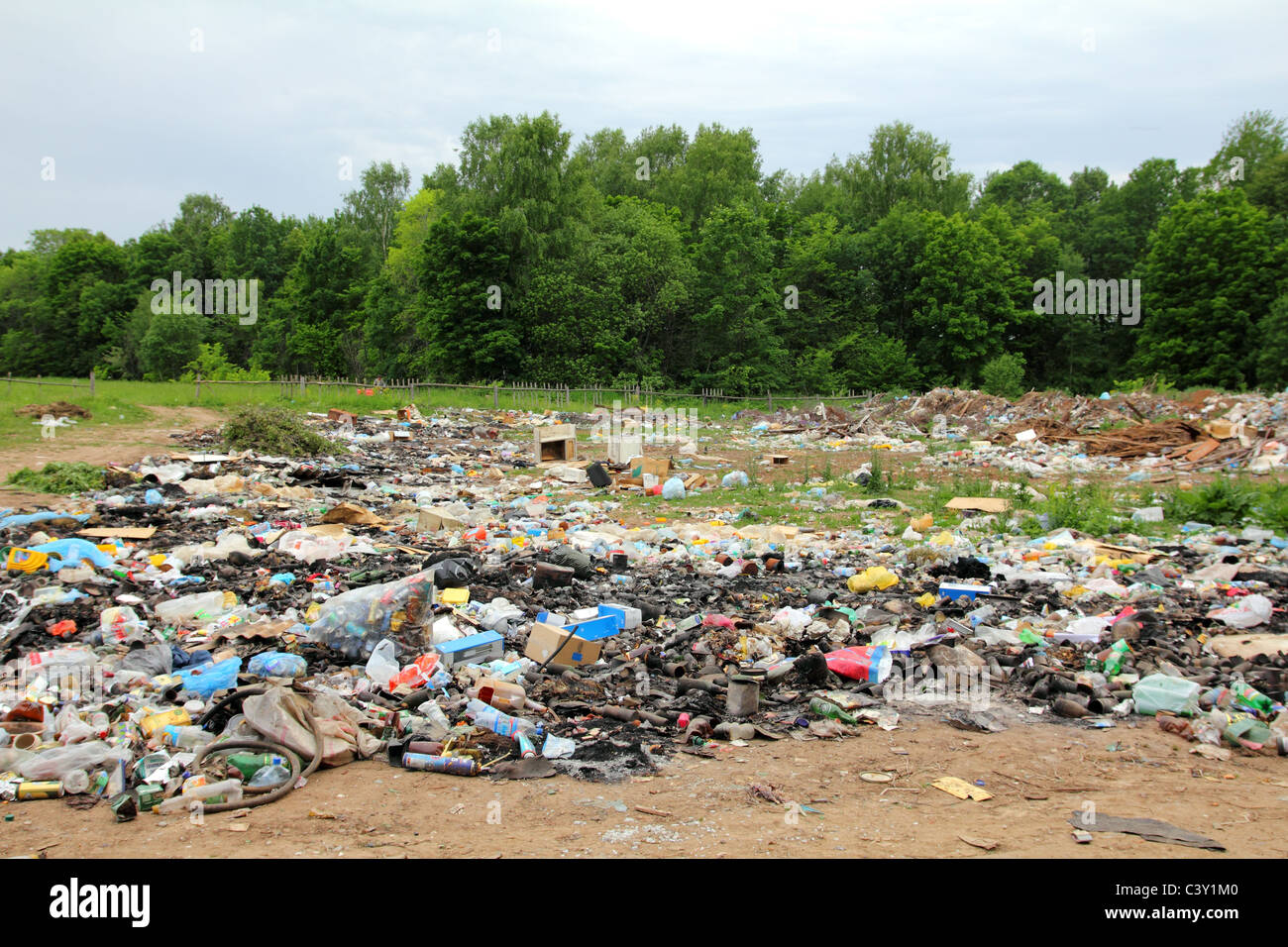 garbage in landfill near forest - environment pollution Stock Photo - Alamy