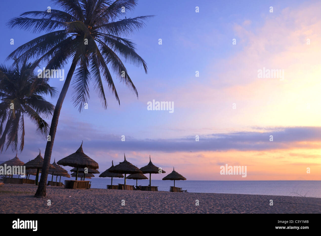 Landscape on beach at sunrise Stock Photo - Alamy