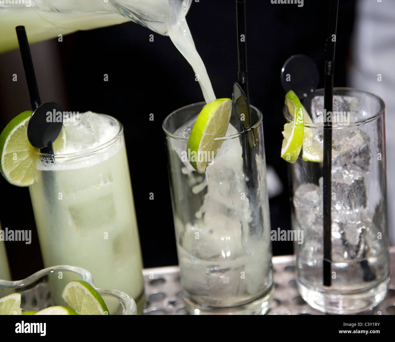 Cocktails poured at a party Stock Photo - Alamy