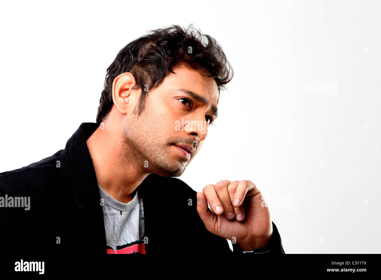 Indian man with serious look hi-res stock photography and images - Alamy