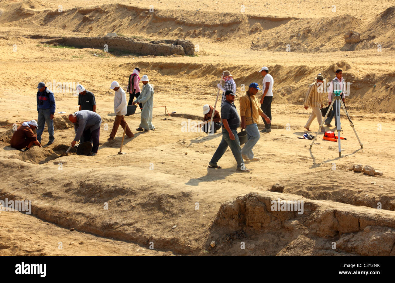CAIRO, EGYPT - NOVEMBER 21, 2010: archaeological digging near statue of ...