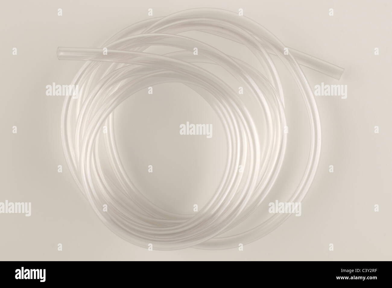 Two meter coil of clear 6mm plastic tubing Stock Photo - Alamy