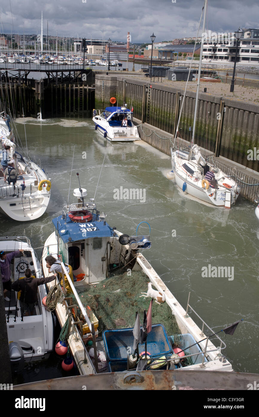 At Swansea, West Glamorgan, Wales the lock fills taking yachts, power ...