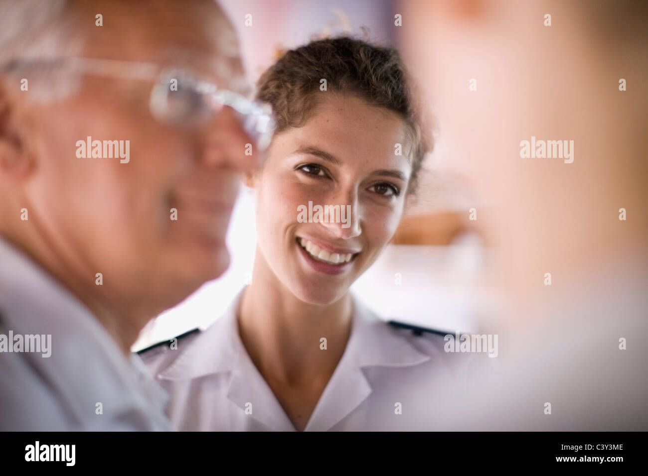 Crew of a ship talking Stock Photo - Alamy