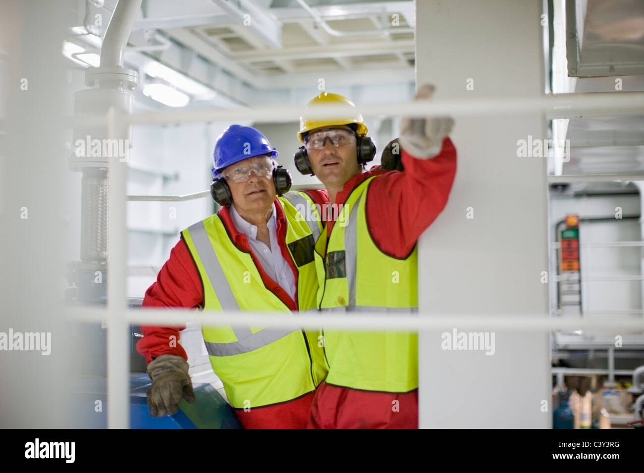 Men doing maintenance works Stock Photo - Alamy