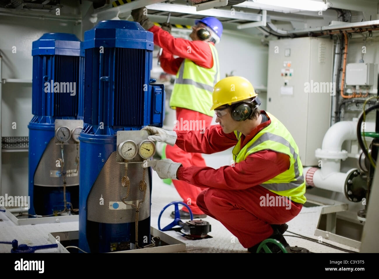 Workers doing maintenance works Stock Photo - Alamy