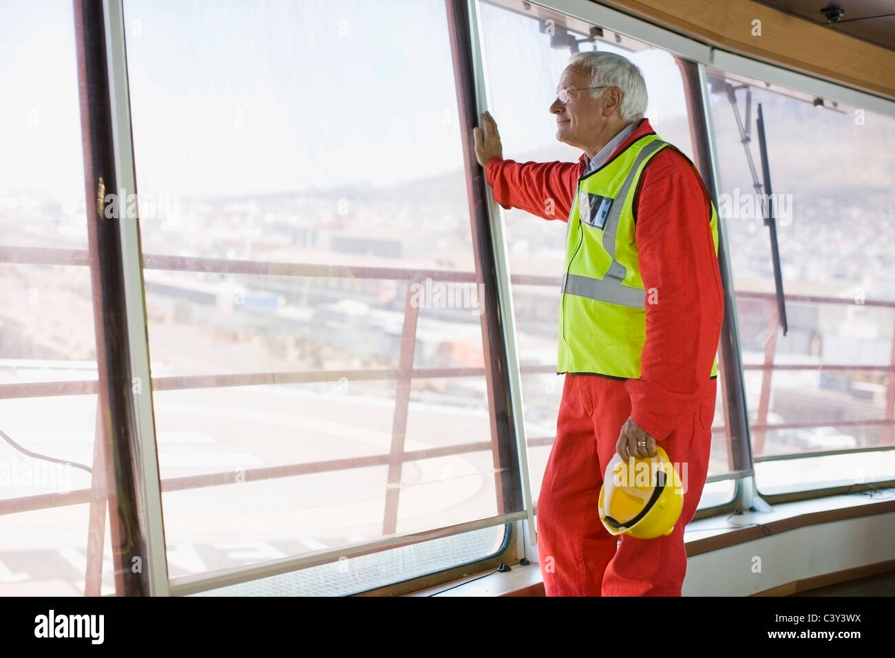 Man leaning on guardrail hi-res stock photography and images - Alamy