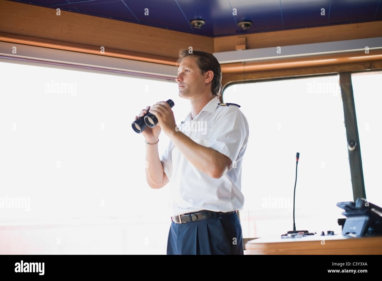 Ship And Captain And Binoculars High Resolution Stock Photography and ...