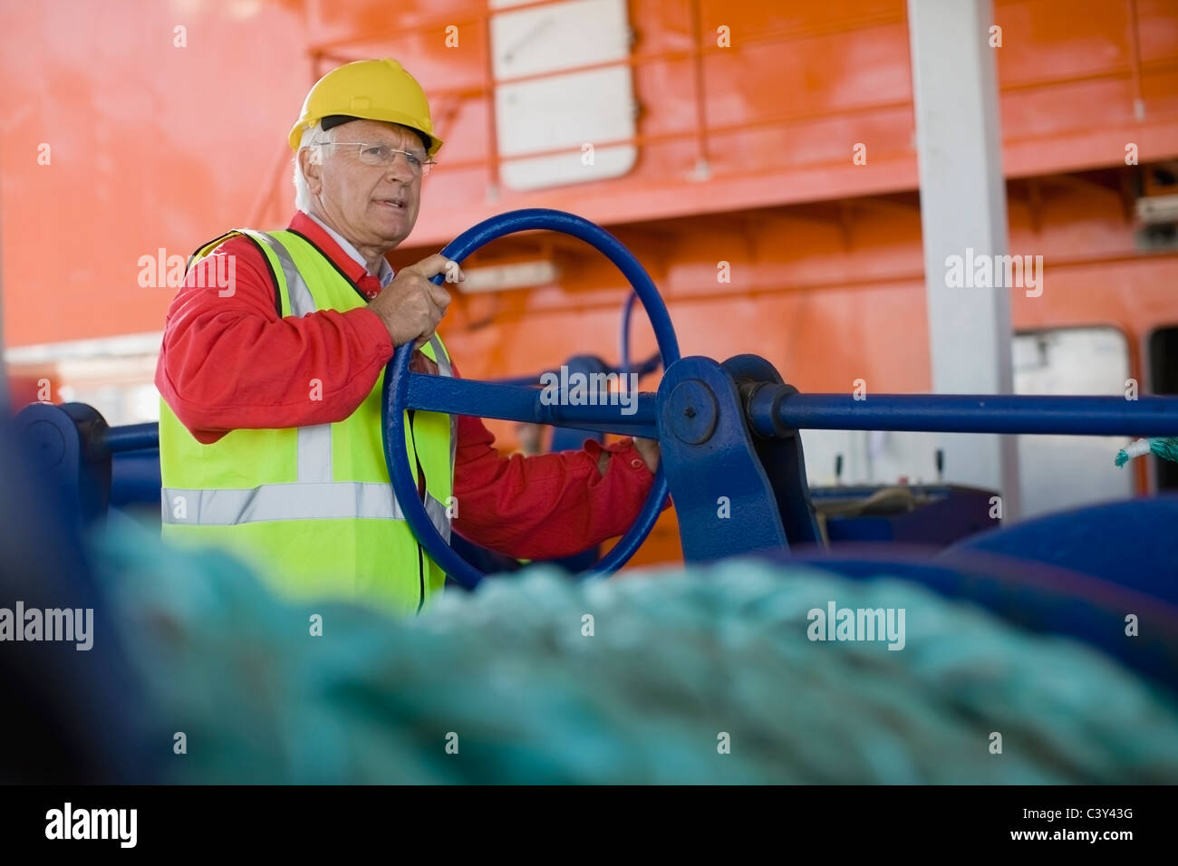 Men opening valve hi-res stock photography and images - Alamy
