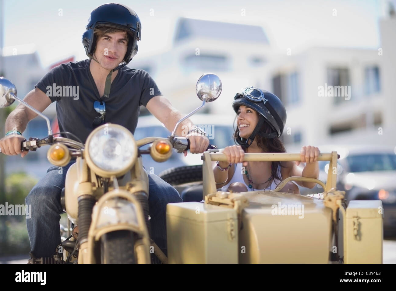 Couple posing sitting on motorcycle hi-res stock photography and images ...