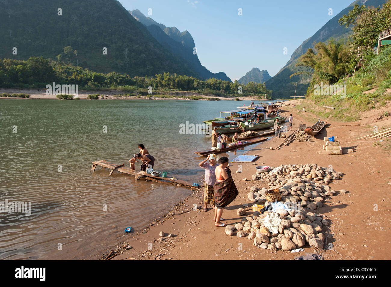 Washing in the river hi-res stock photography and images - Alamy