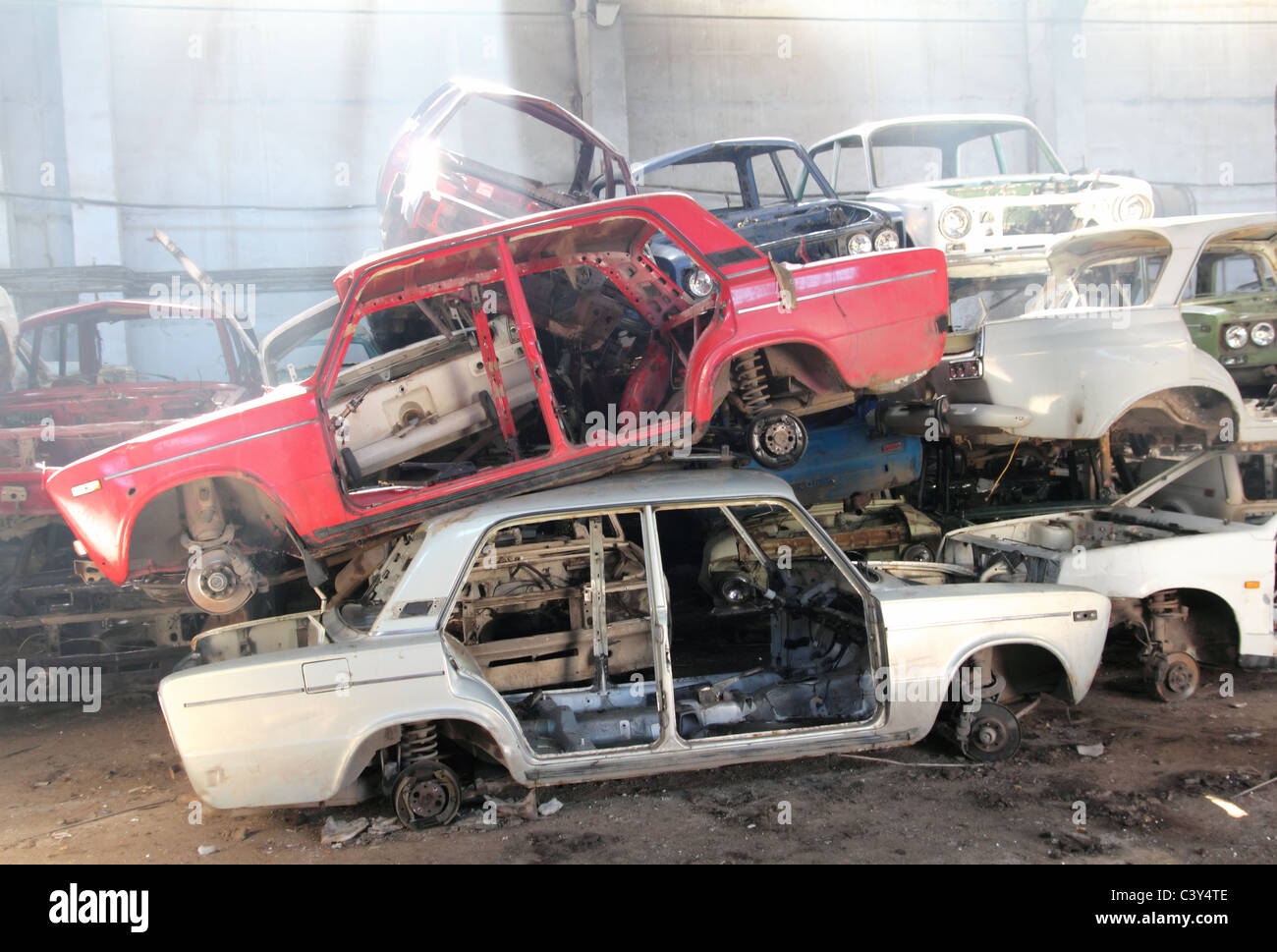heap of cars is returned for recycling as scrap metal Stock Photo - Alamy