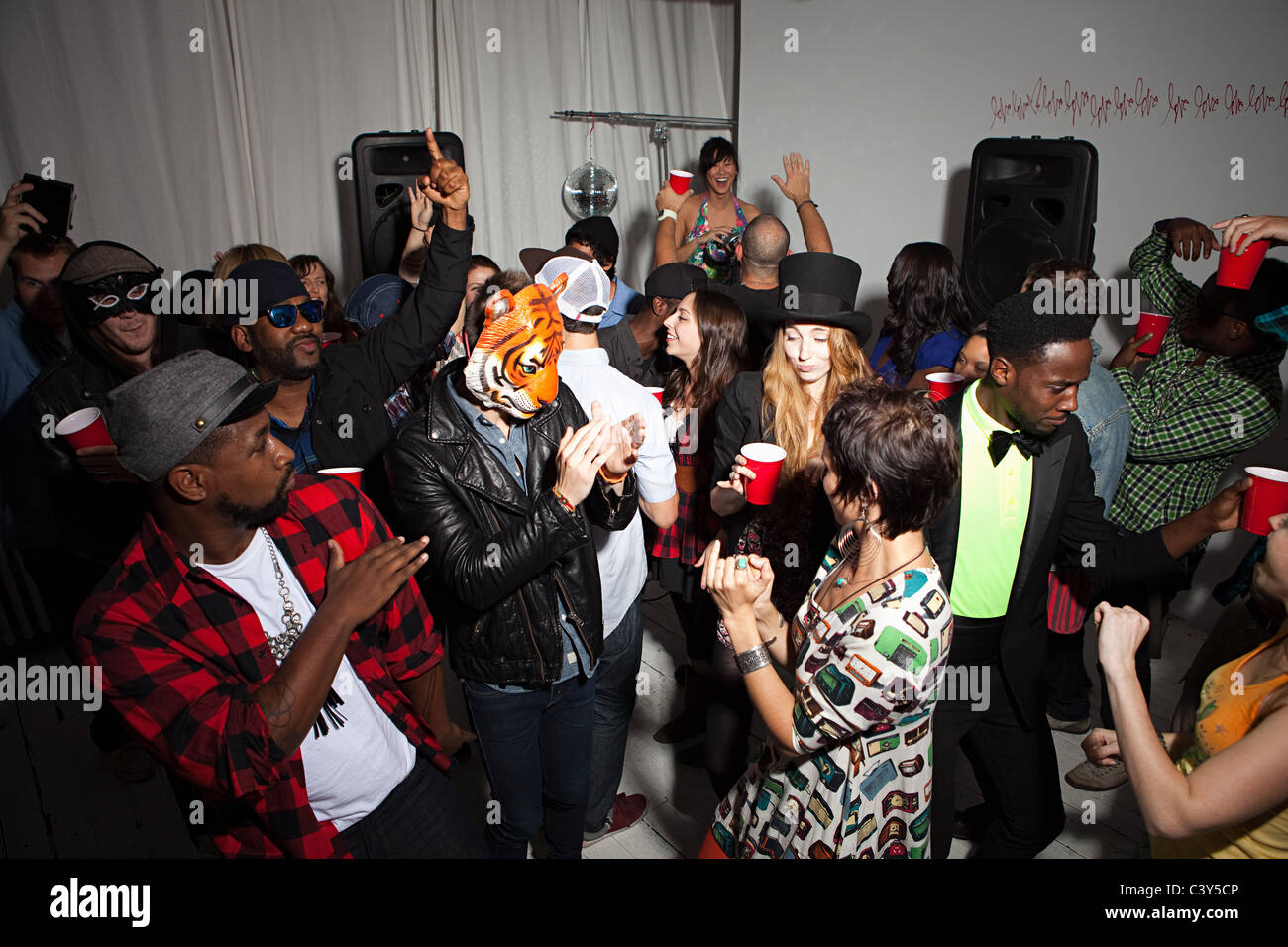People Dancing At A House Party